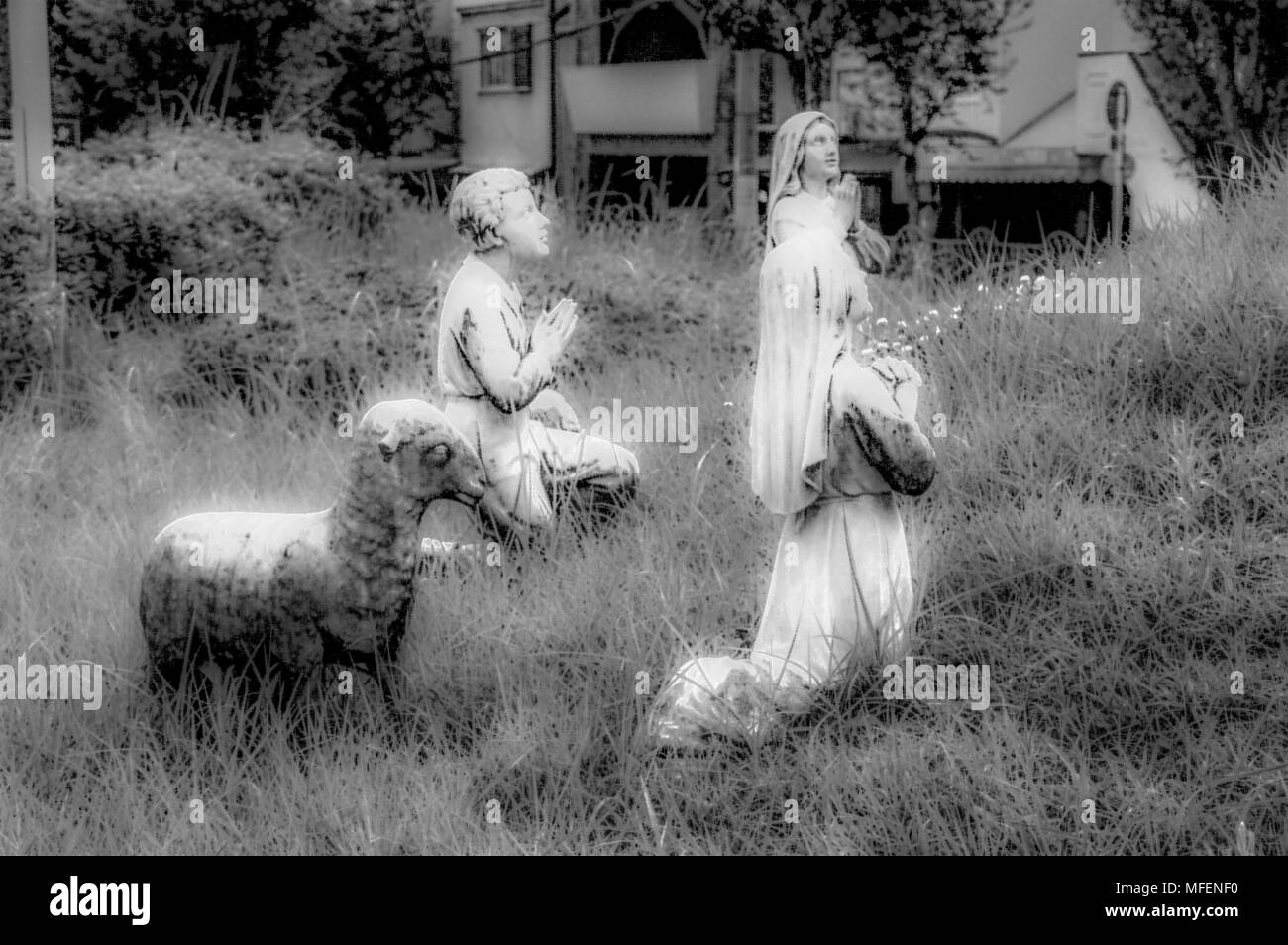 Stone Statues Praying To God At The Osaka Catholic Church Japan In ...