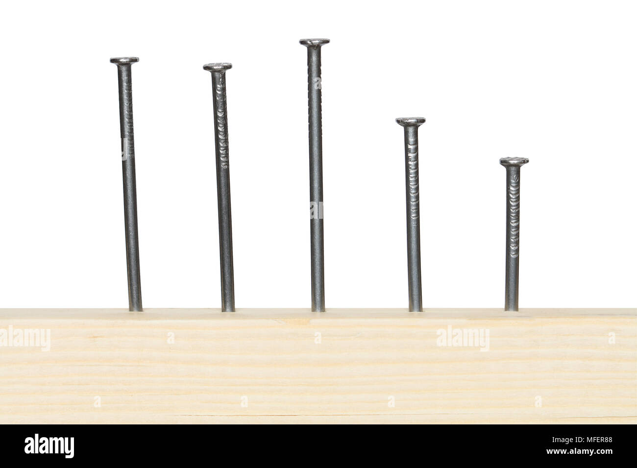 Few nails driving-in wooden board isolated on white background with ...