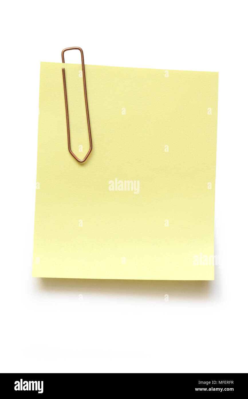 Blank yellow note with metal paper clip isolated on white background ...