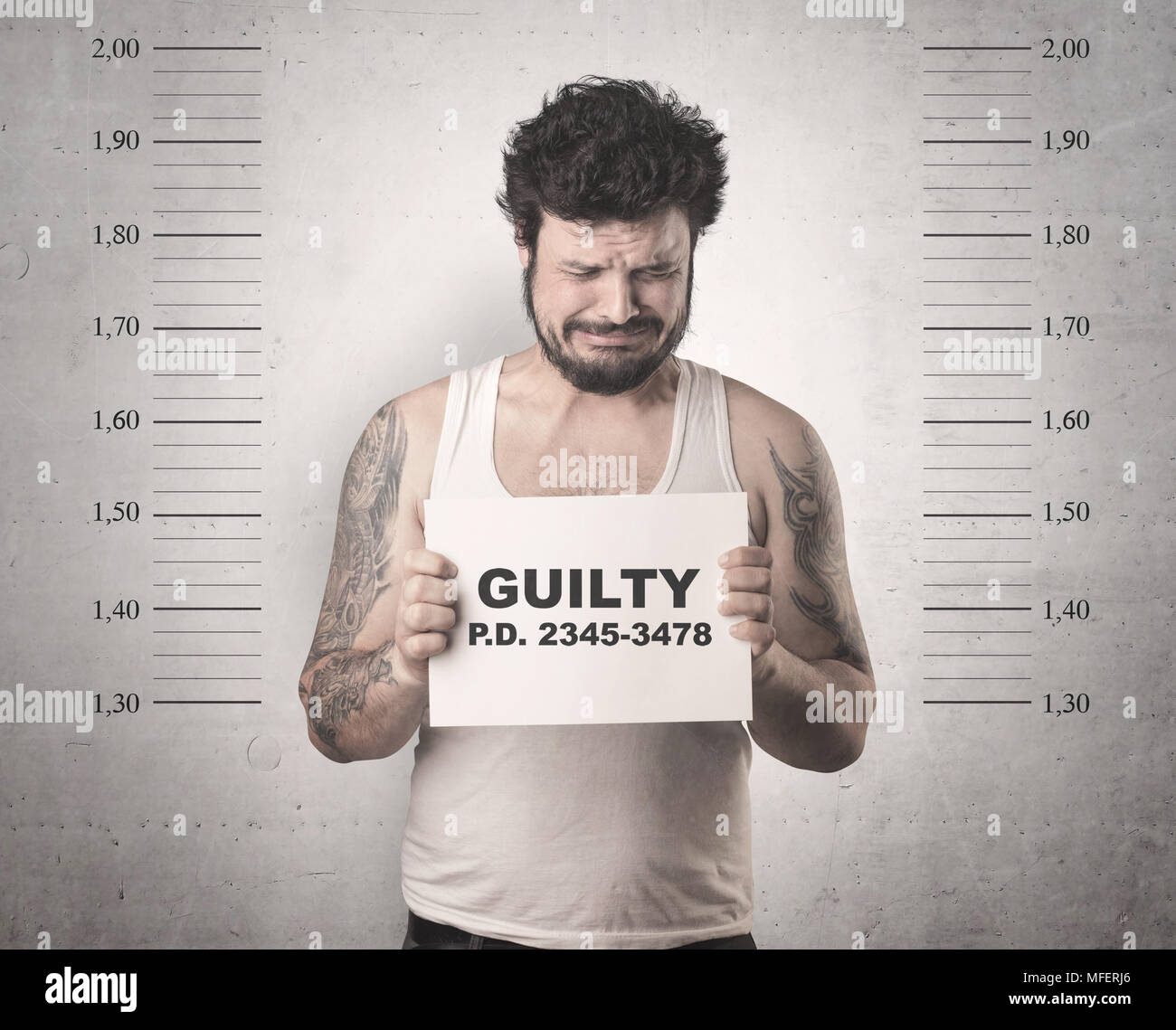 Caught guilty man with ID signs on his hand Stock Photo - Alamy