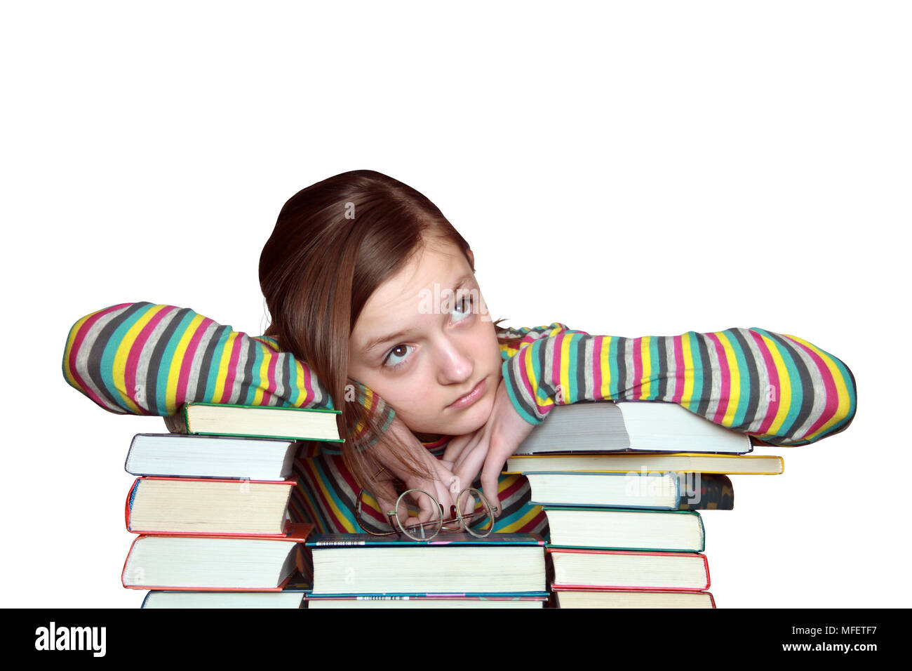 Sad girl portrait with stack of books. Isolated on white with clipping ...