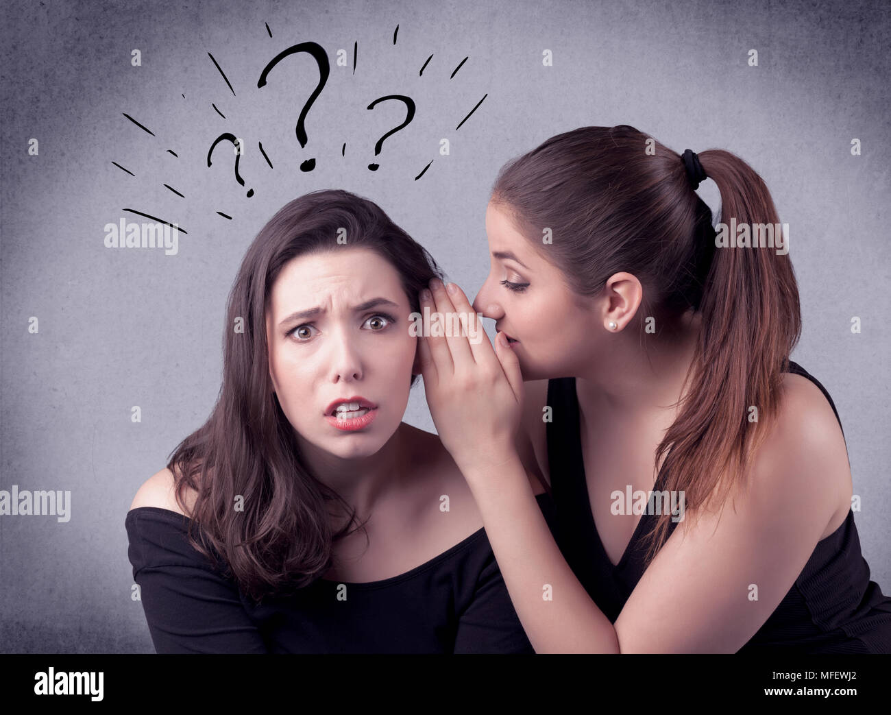 A teenager girl looking confused with drawn question marks above the ...