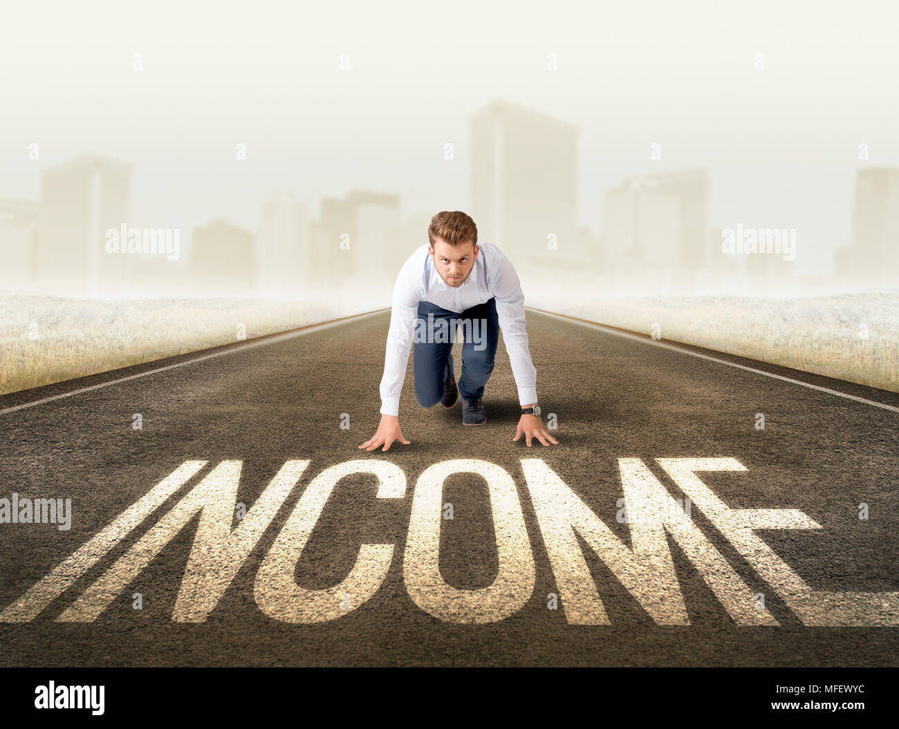 Young determined businessman kneeling before income sign Stock Photo ...