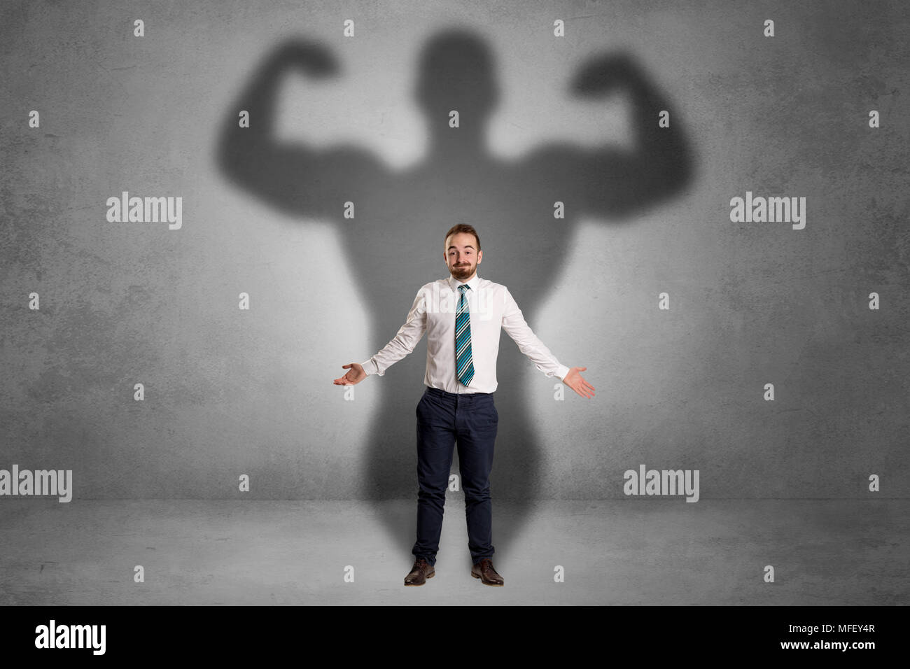 Businessman shadow strong muscular hi-res stock photography and images ...
