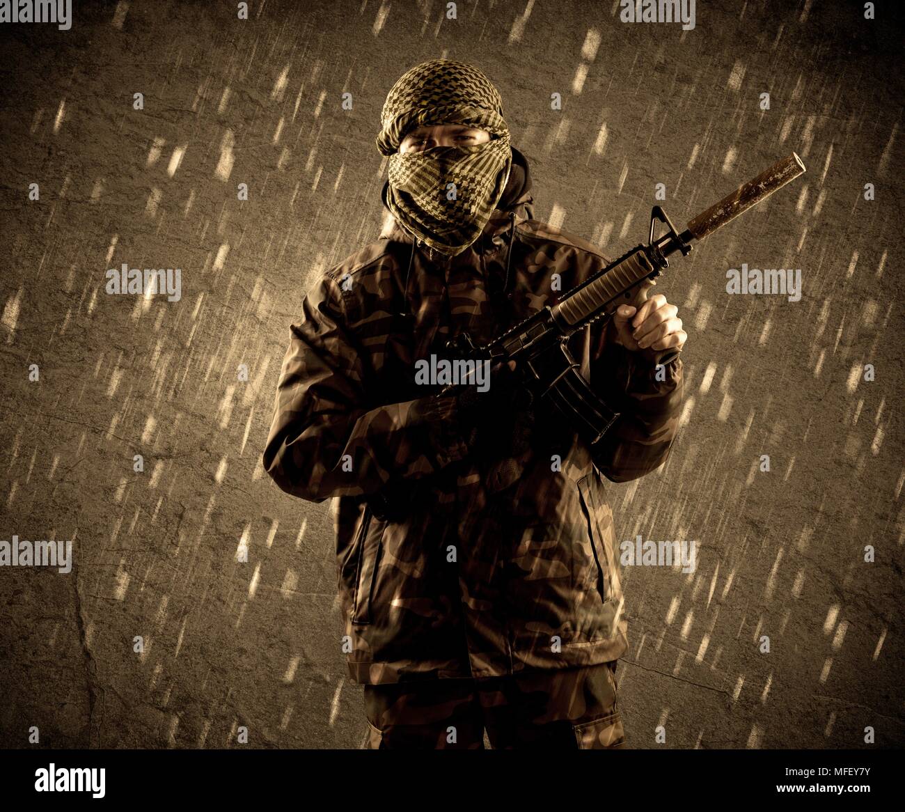 Portrait of dangerous heavily armed terrorist soldier with mask on ...