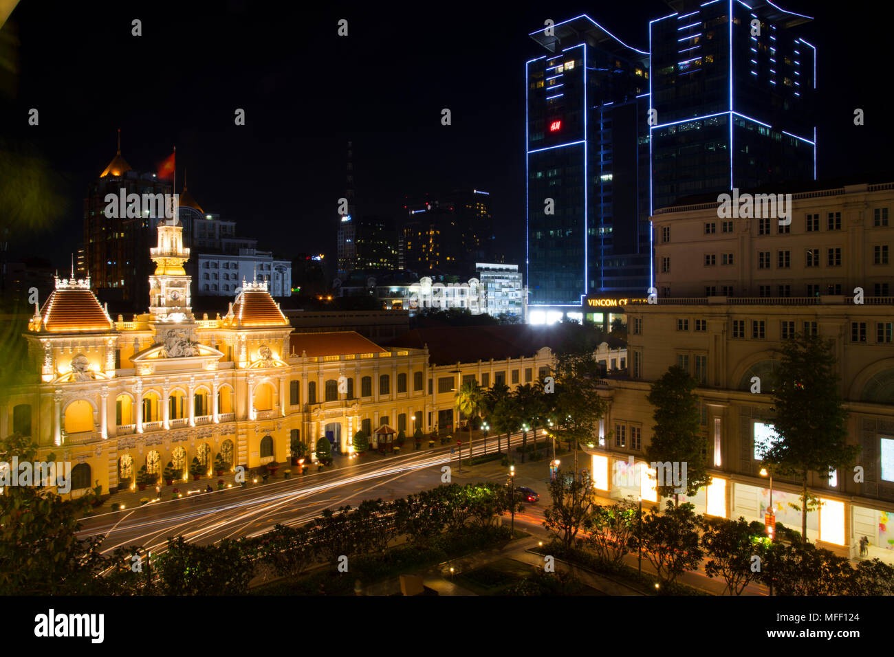 A view of the People’s Committee Building at night in Ho Chi Minh City ...