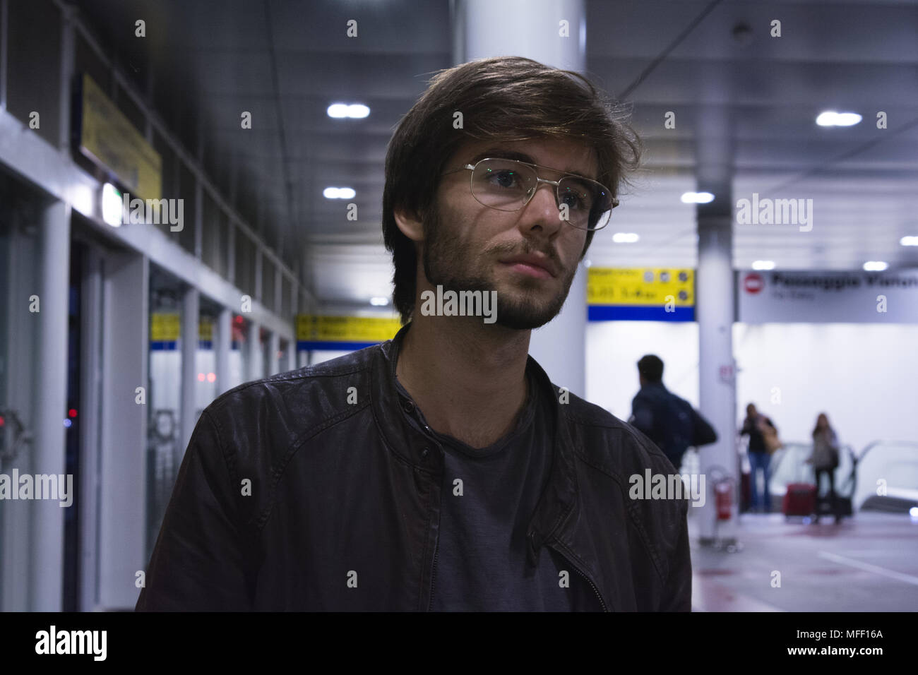 Sad young man in train hi-res stock photography and images - Alamy