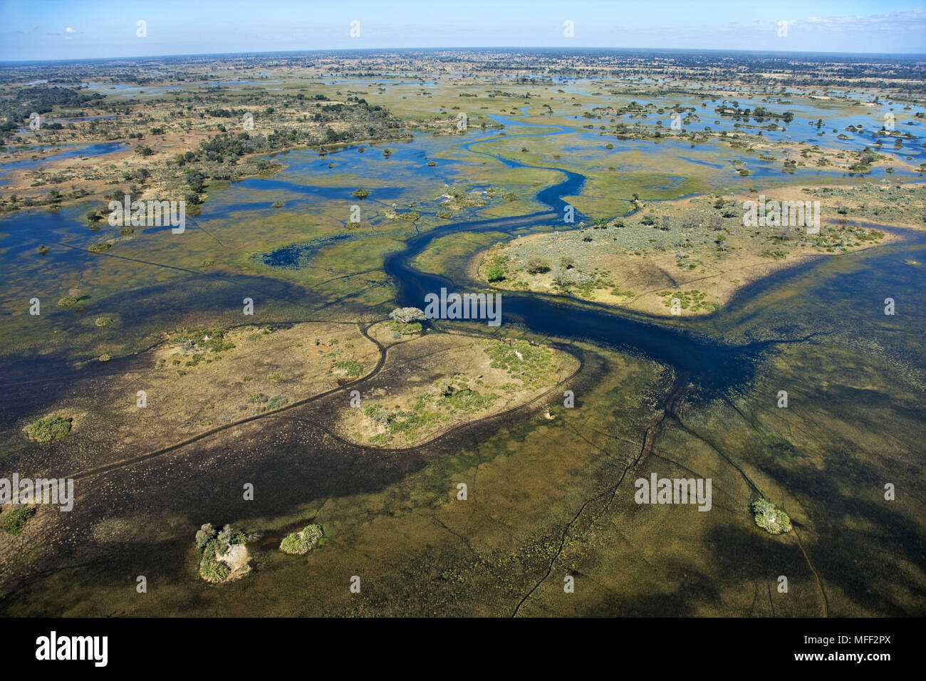 Aerial view of islands and waterways Central Okovango wilderness area ...