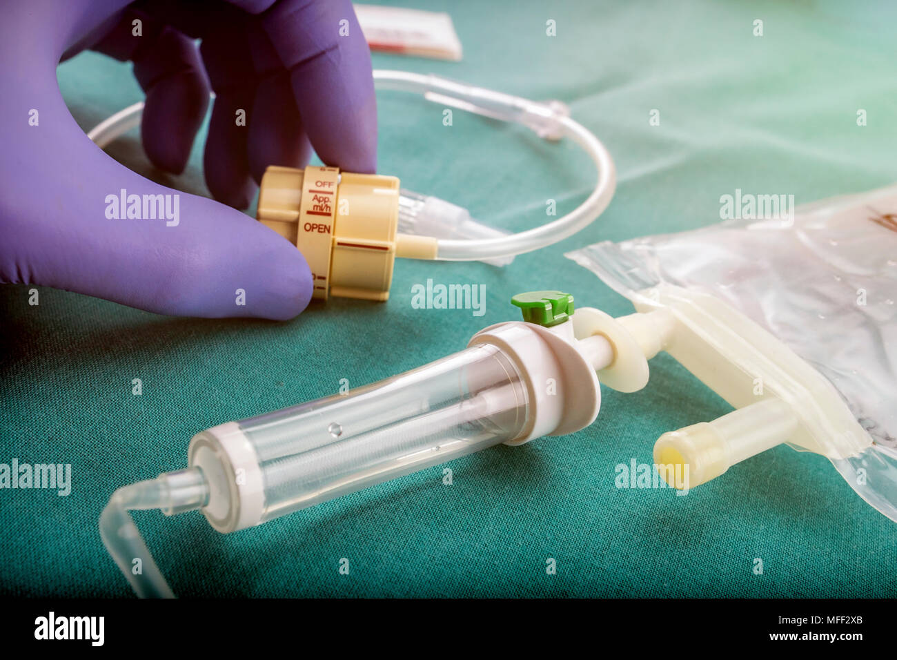 Doctor holds a flow dial on a hospital table, conceptual image Stock ...