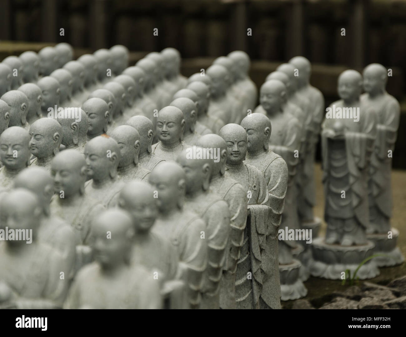 Japanese budhist monk statues praying and meditating Stock Photo - Alamy
