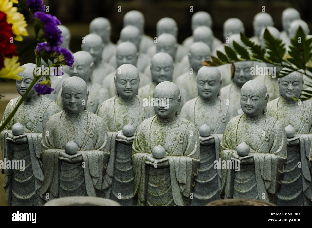 Japanese budhist monk statues praying and meditating Stock Photo - Alamy