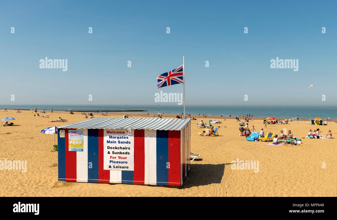Margate beach from the promenade with the deckchair hut in the ...