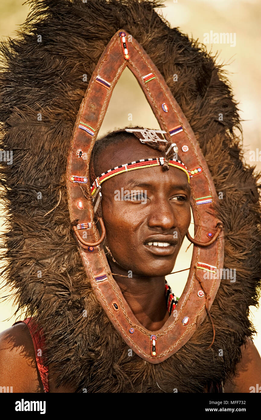 YOUNG MASAI MORAN (warrior youth) with ostrich feather headdress. Near ...