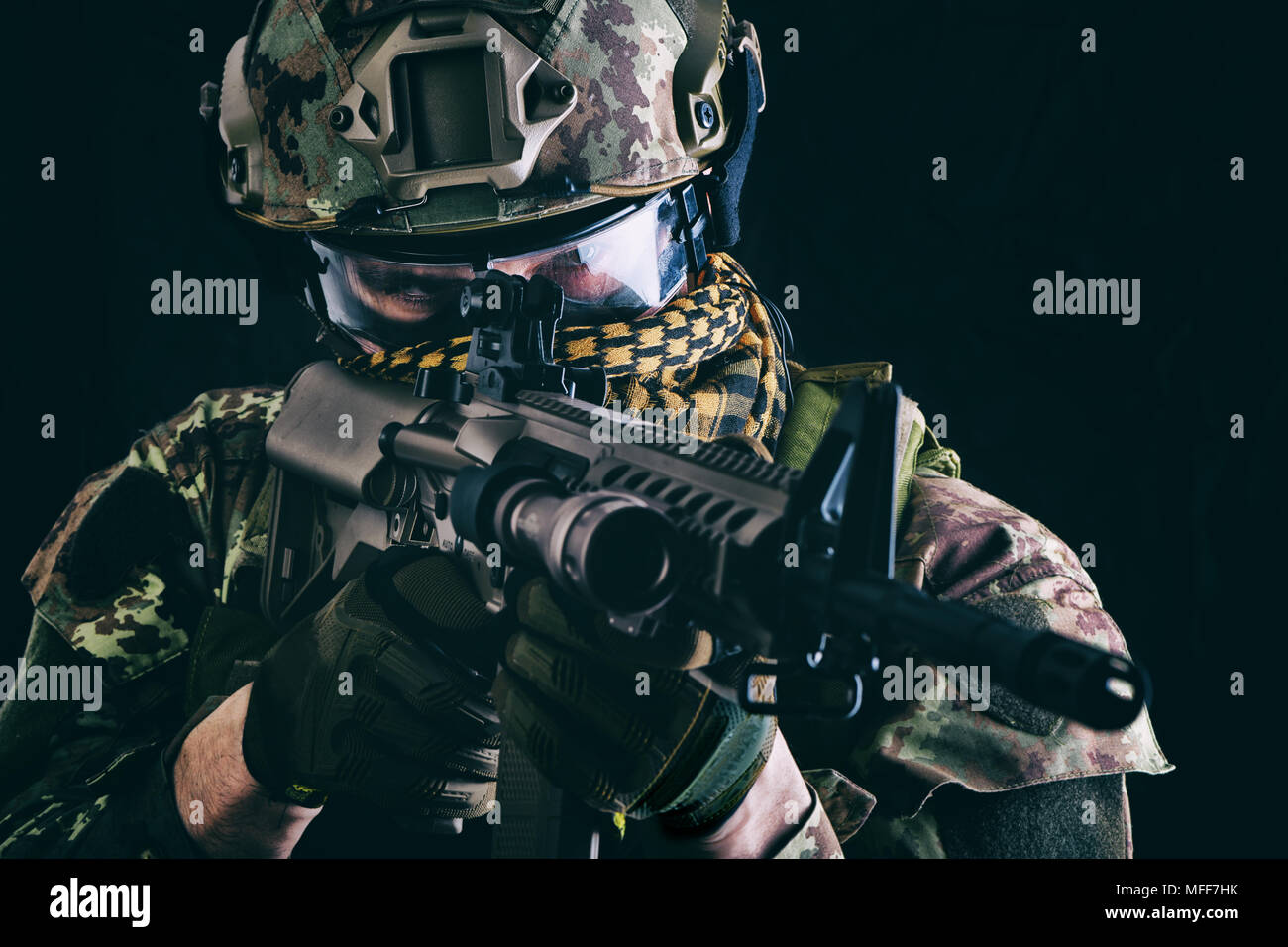 close up portrait of handsome military man. Macro shot on black ...