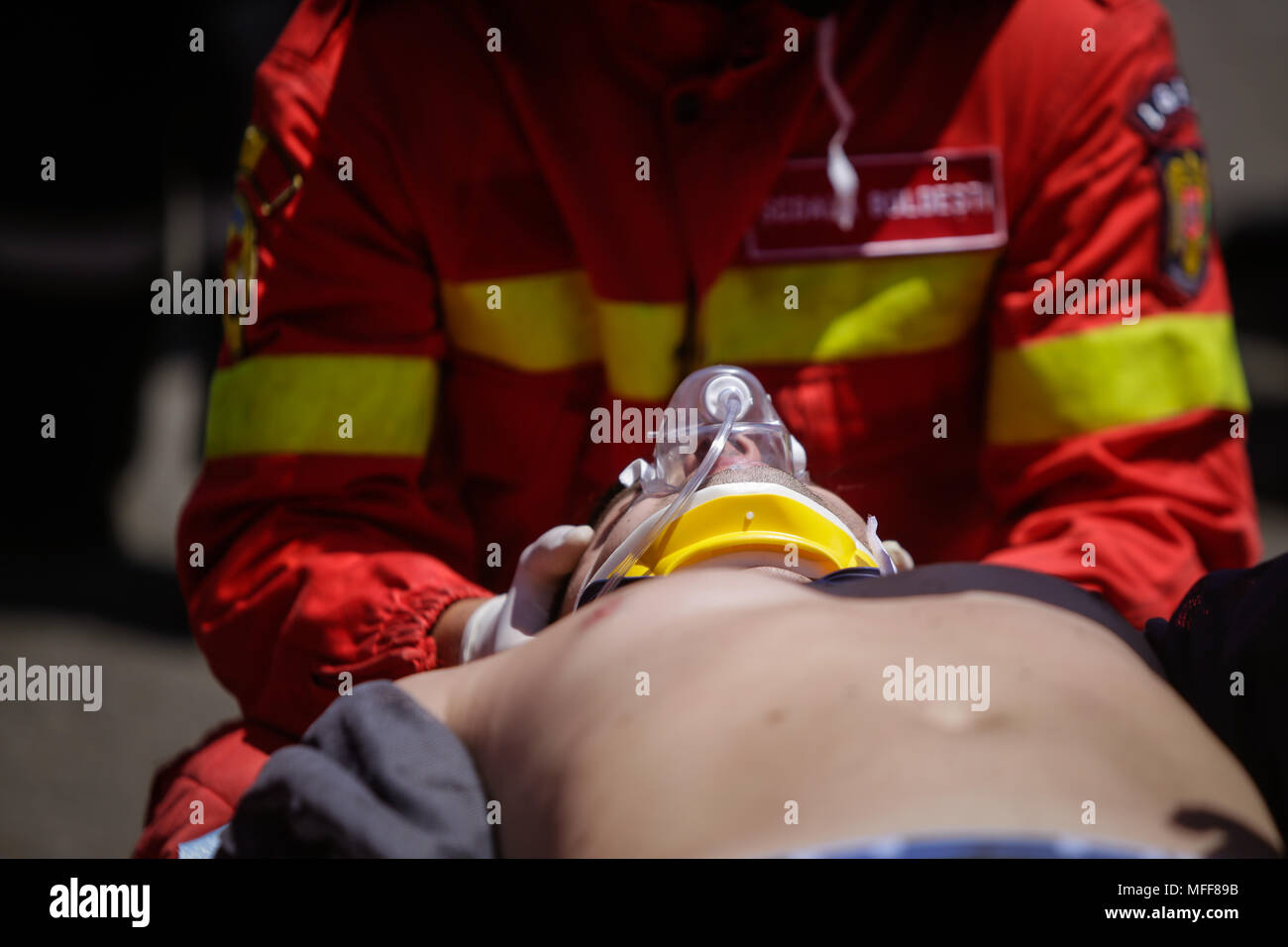 Rescue firefighters and paramedics take part in a vehicle extrication ...
