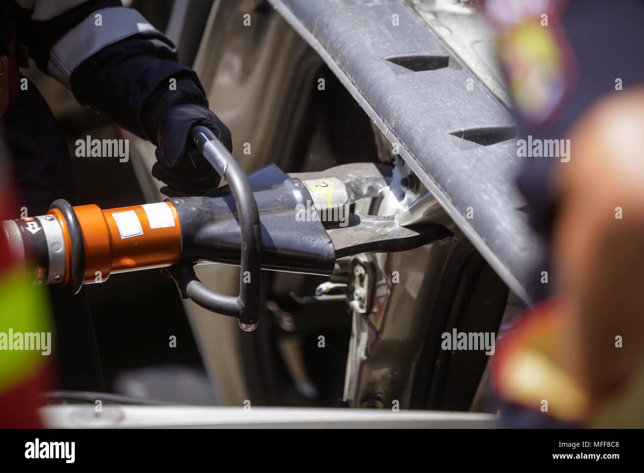 Rescue firefighters and paramedics take part in a vehicle extrication ...