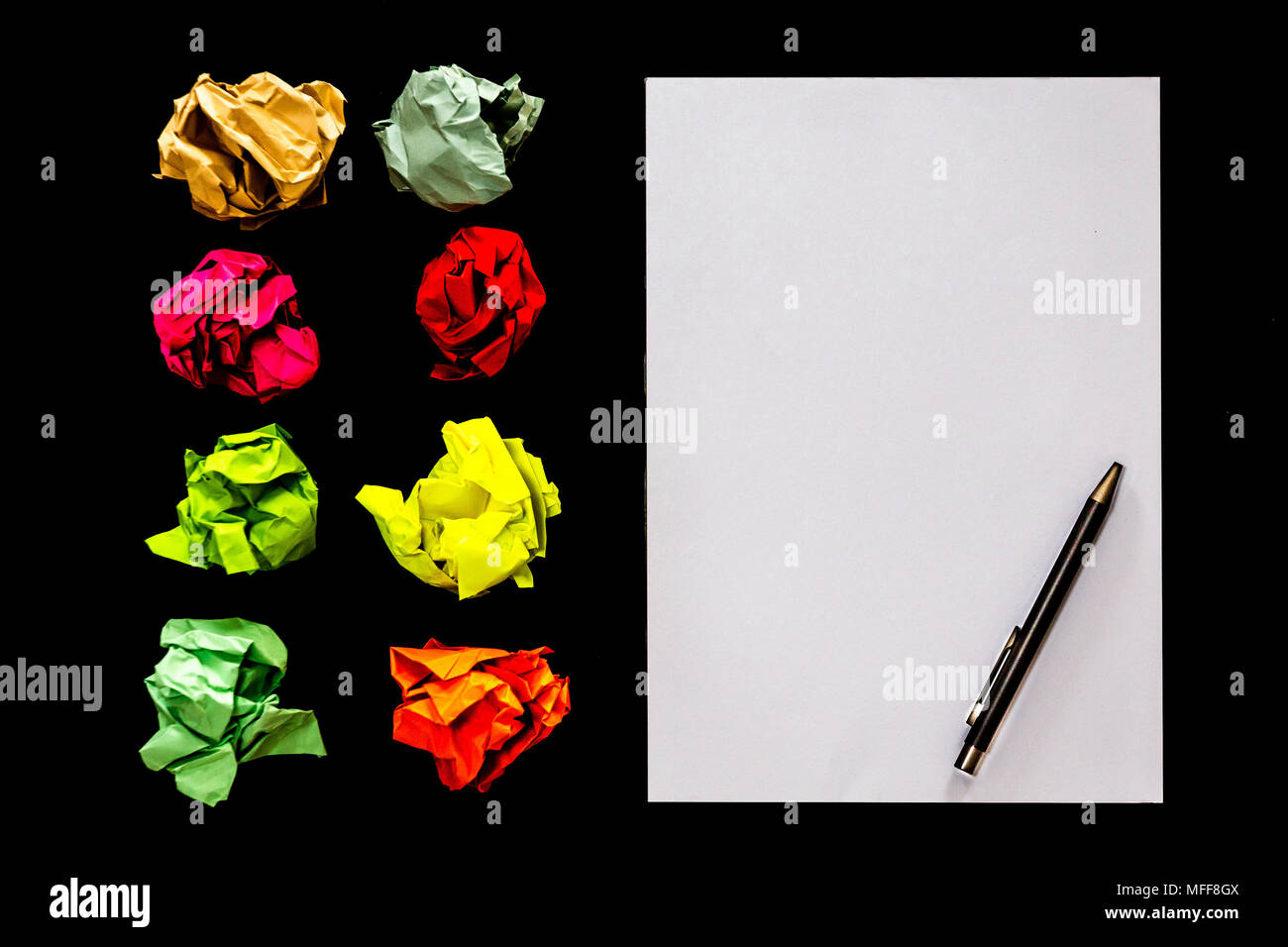 top view of office desk with blank notebook paper pen rope carabiner ...