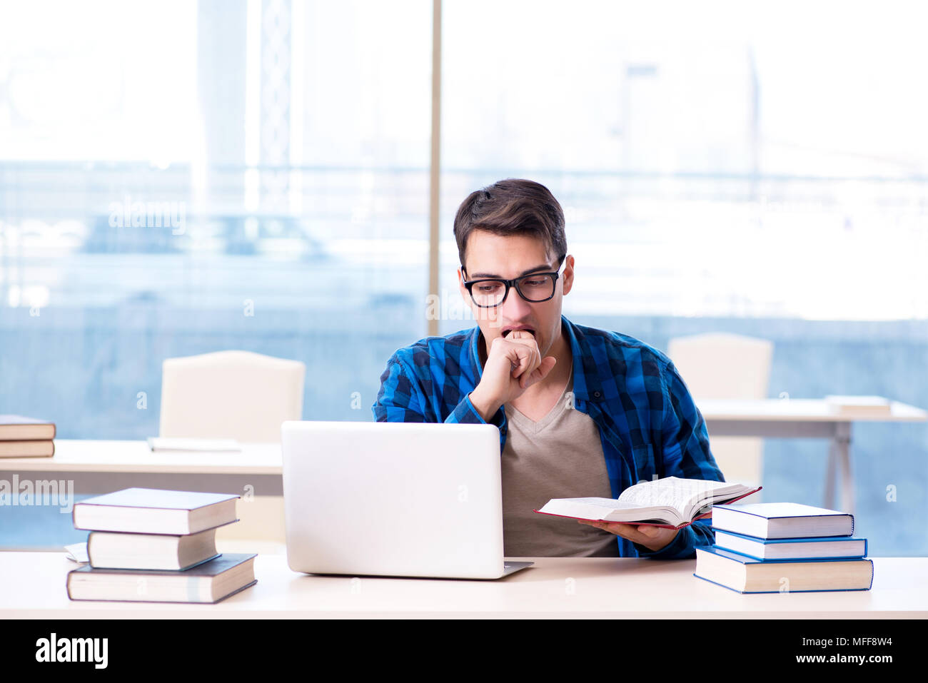 Student in telelearning distance learning concept reading in library ...