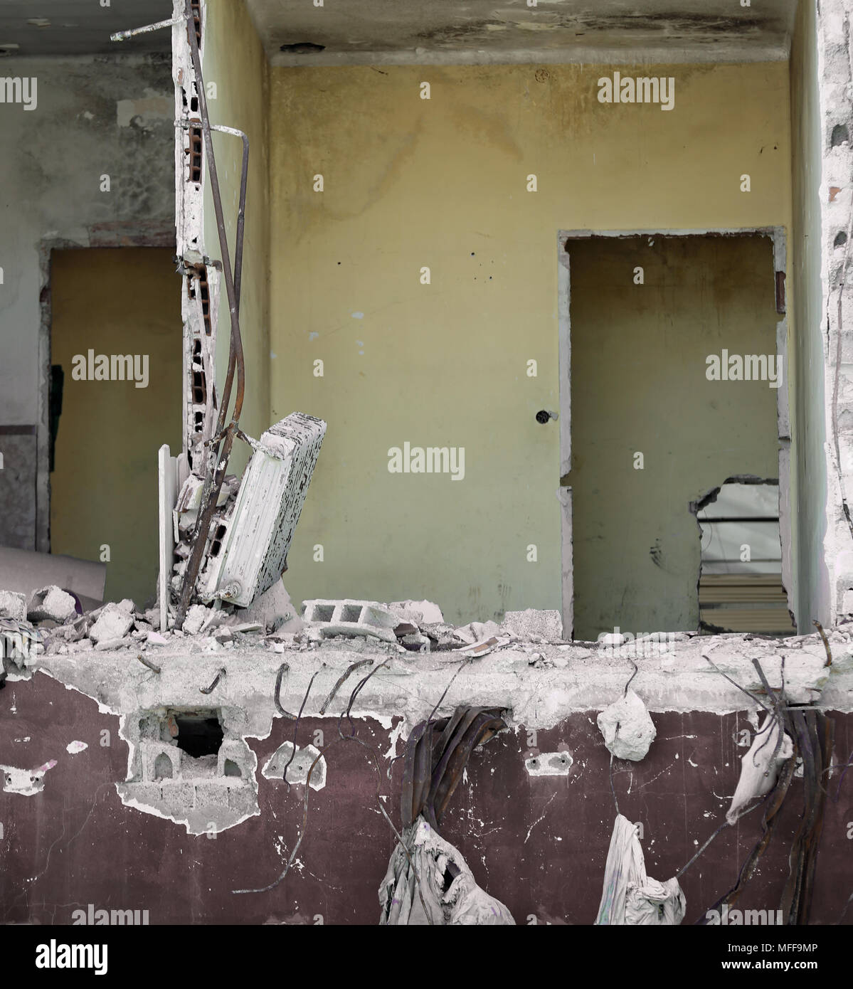completely destroyed room of a house with collapsed walls after the ...