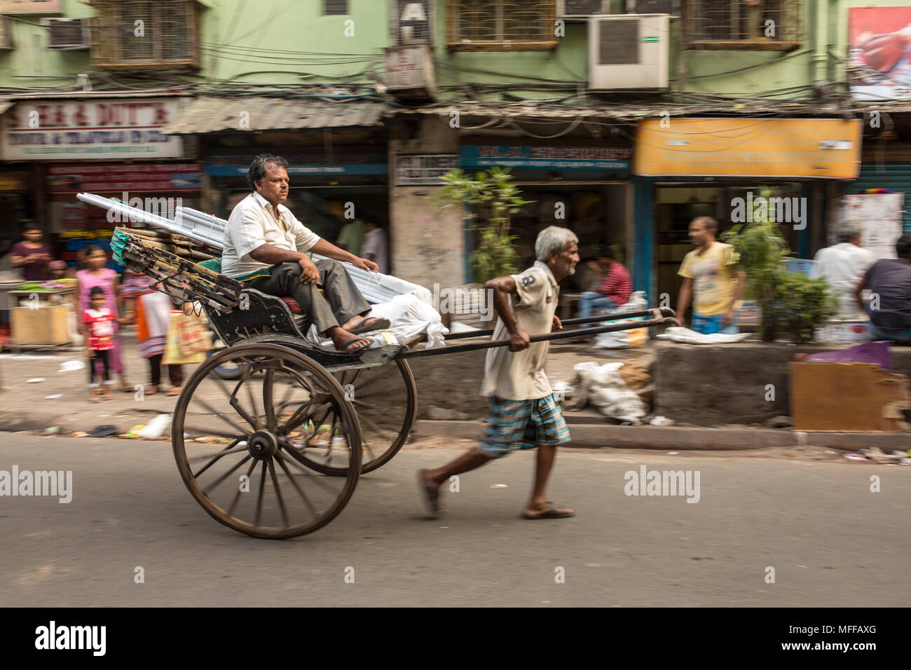 Human pulled rickshaw hi-res stock photography and images - Alamy