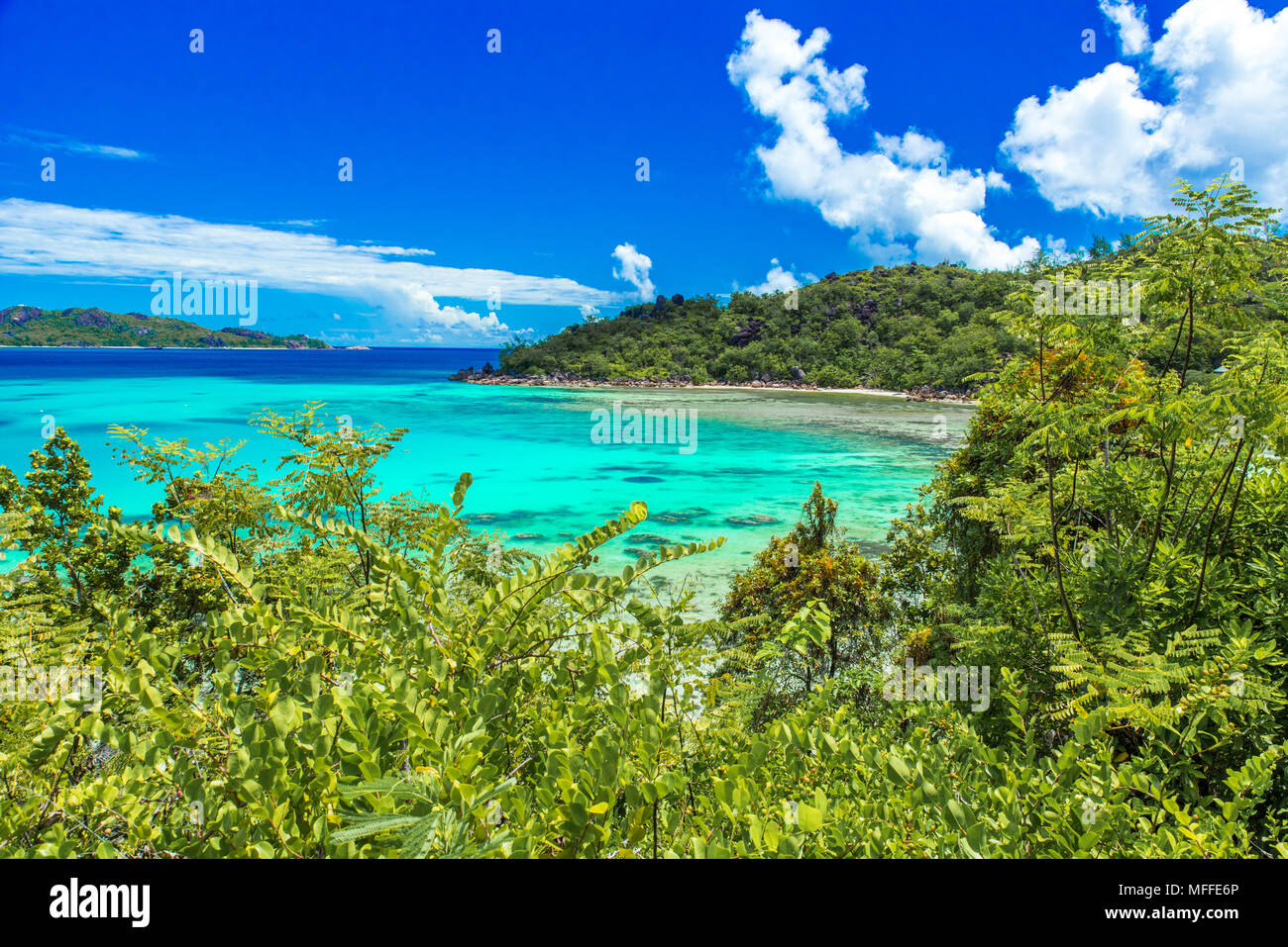 Yacht in paradise bay of Seychelles, Praslin Stock Photo - Alamy