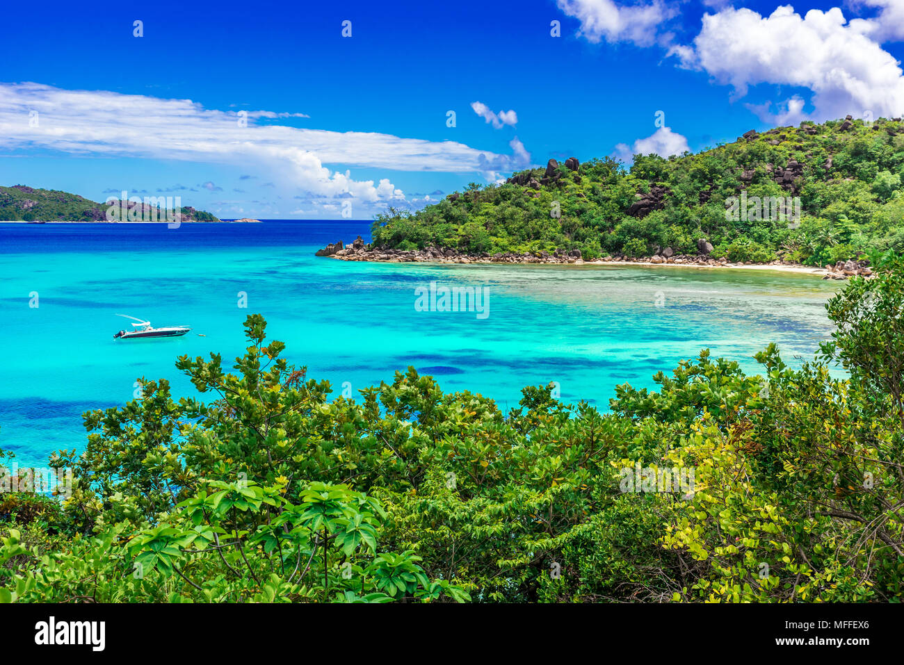 Yacht in paradise bay of Seychelles, Praslin Stock Photo - Alamy