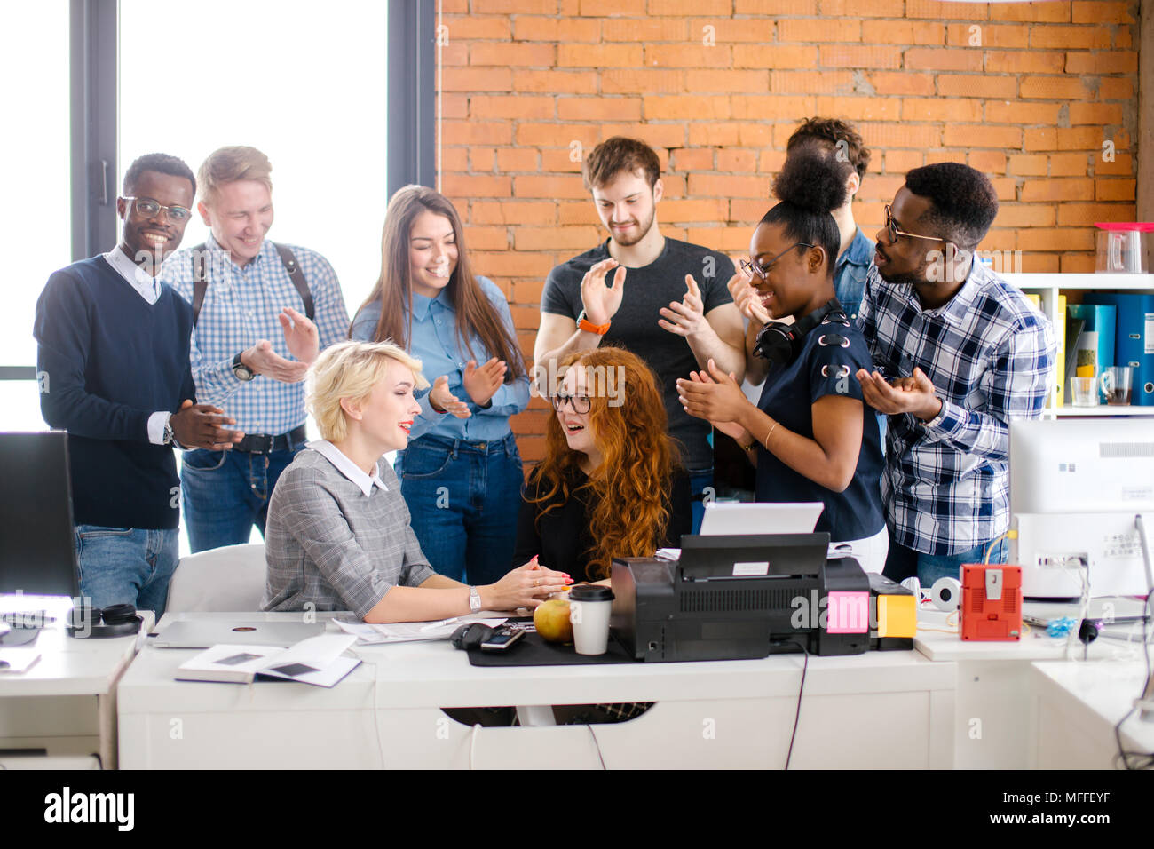 all members of company is making a compliment to their partner with red ...