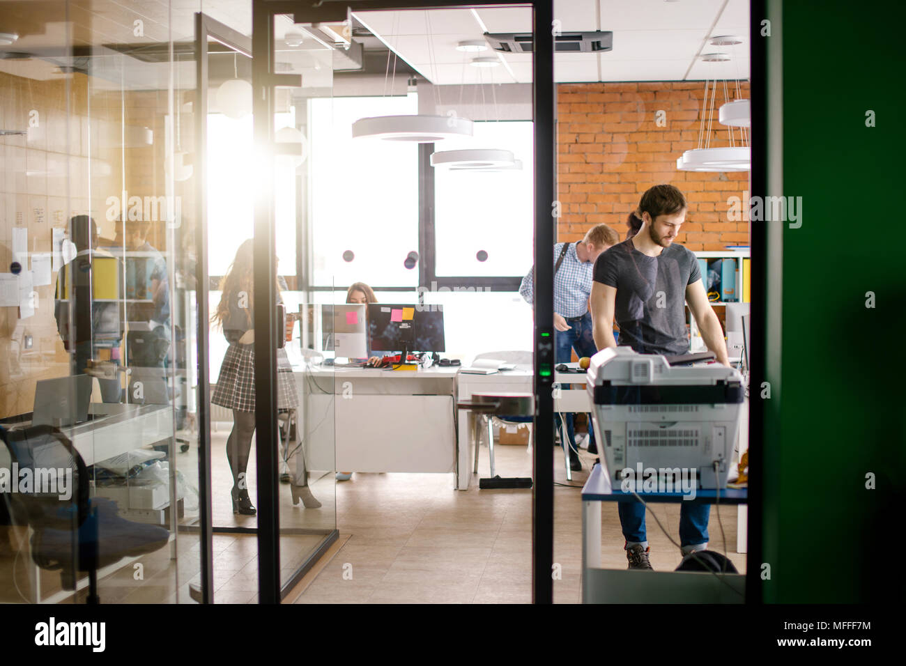 working hours in the startup business office Stock Photo - Alamy