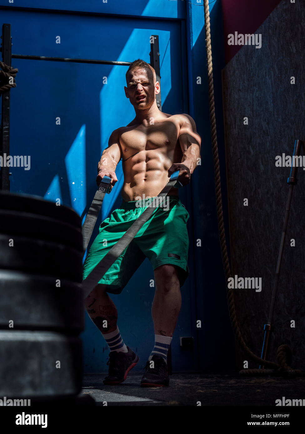 Man pulling sled hi-res stock photography and images - Alamy