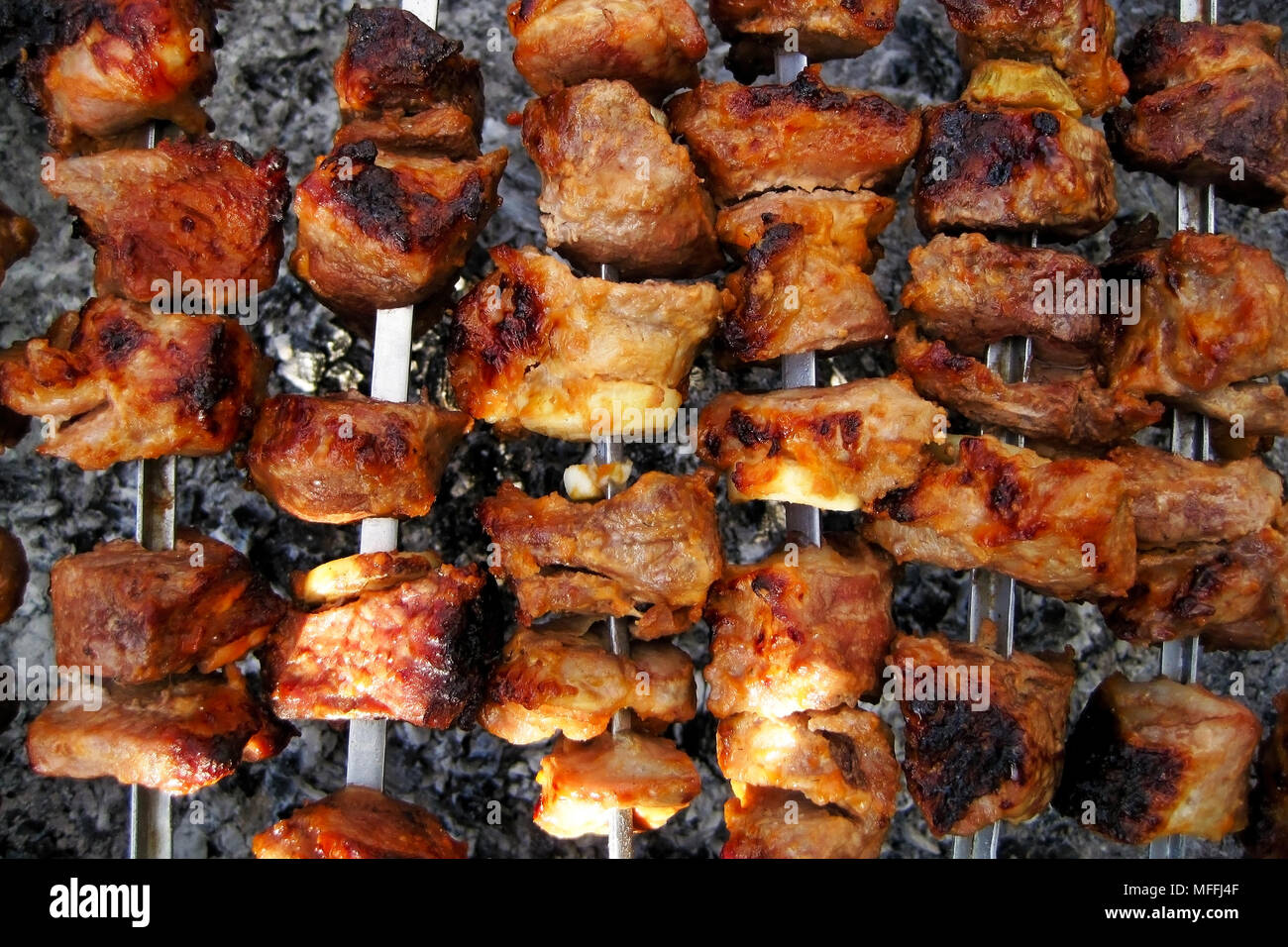 Shish kebab on skewers grilled on charcoal. The view from the top Stock ...
