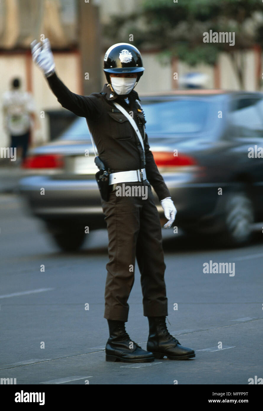 TRAFFIC POLICEMEN wearing anti-pollution mask Bangkok, Thailand Stock ...