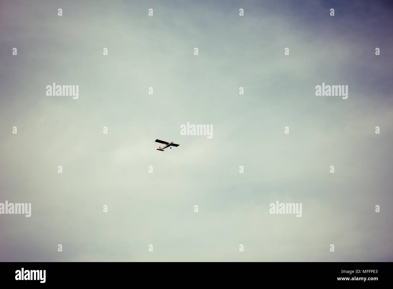 Light aircraft flying in the sky Stock Photo - Alamy