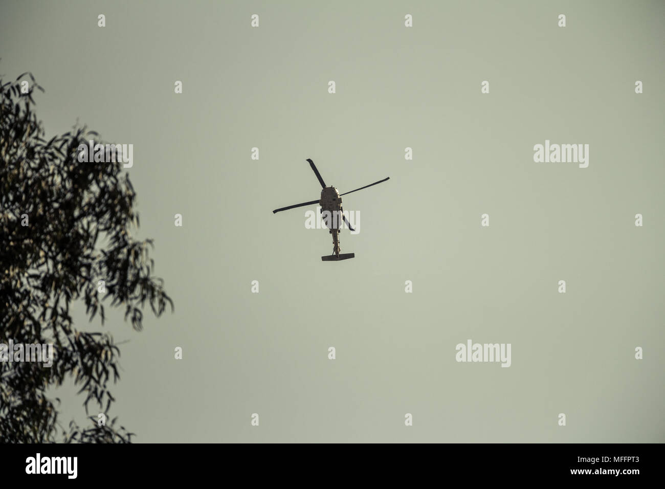Israeli military UH-60 Black Hawk helicopter flying in the sky. Low ...