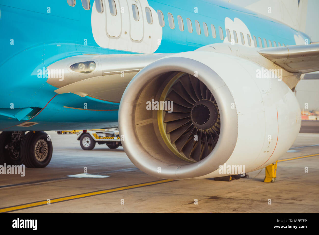 Close up view of airplane turbine engine while it being preparing ready ...