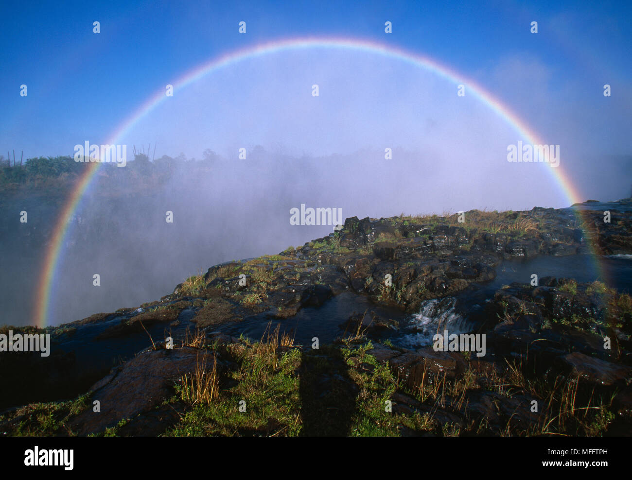 RAINBOW over Victoria Falls Zimbabwe, southern Africa Stock Photo - Alamy