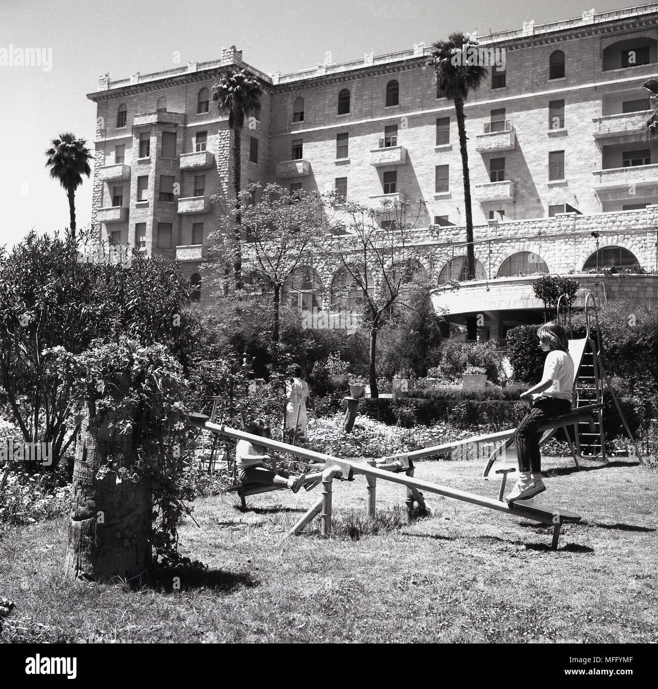 Children playing outside 1950s hi-res stock photography and images - Alamy