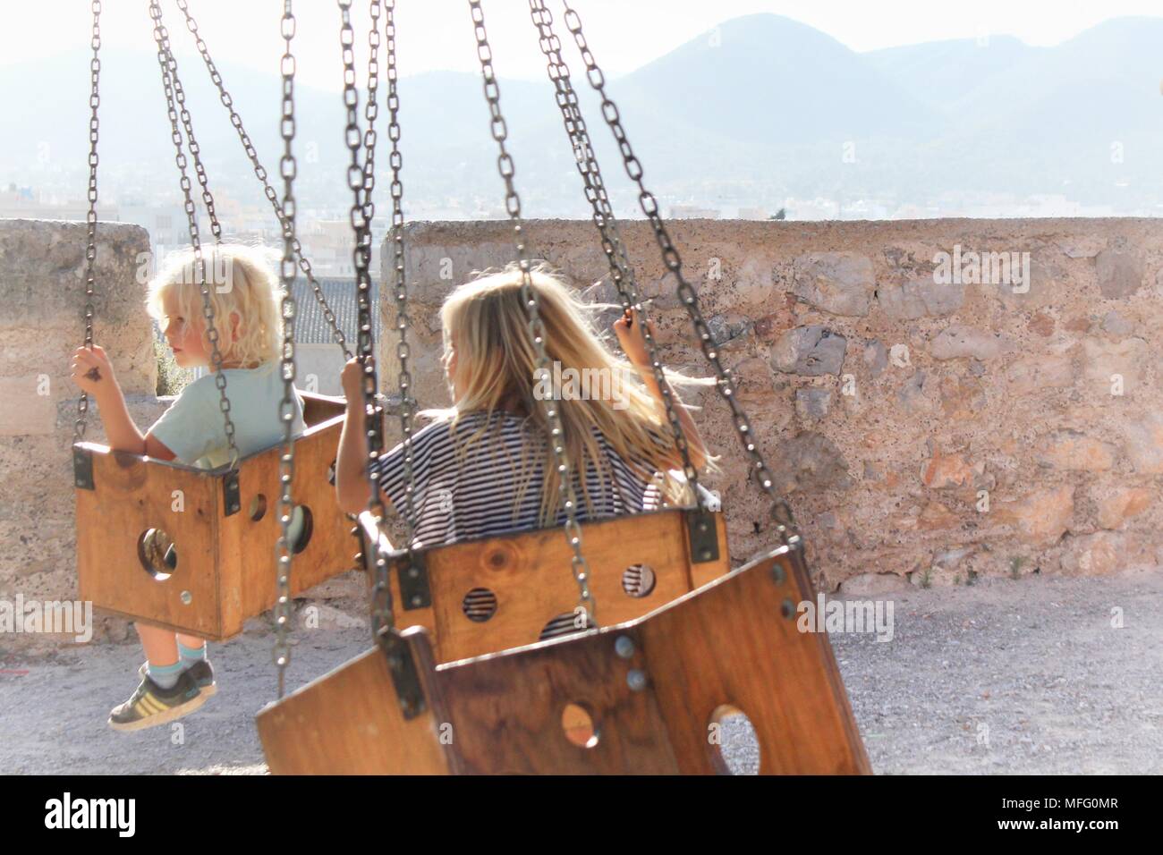 Merry go round swing hi-res stock photography and images - Alamy