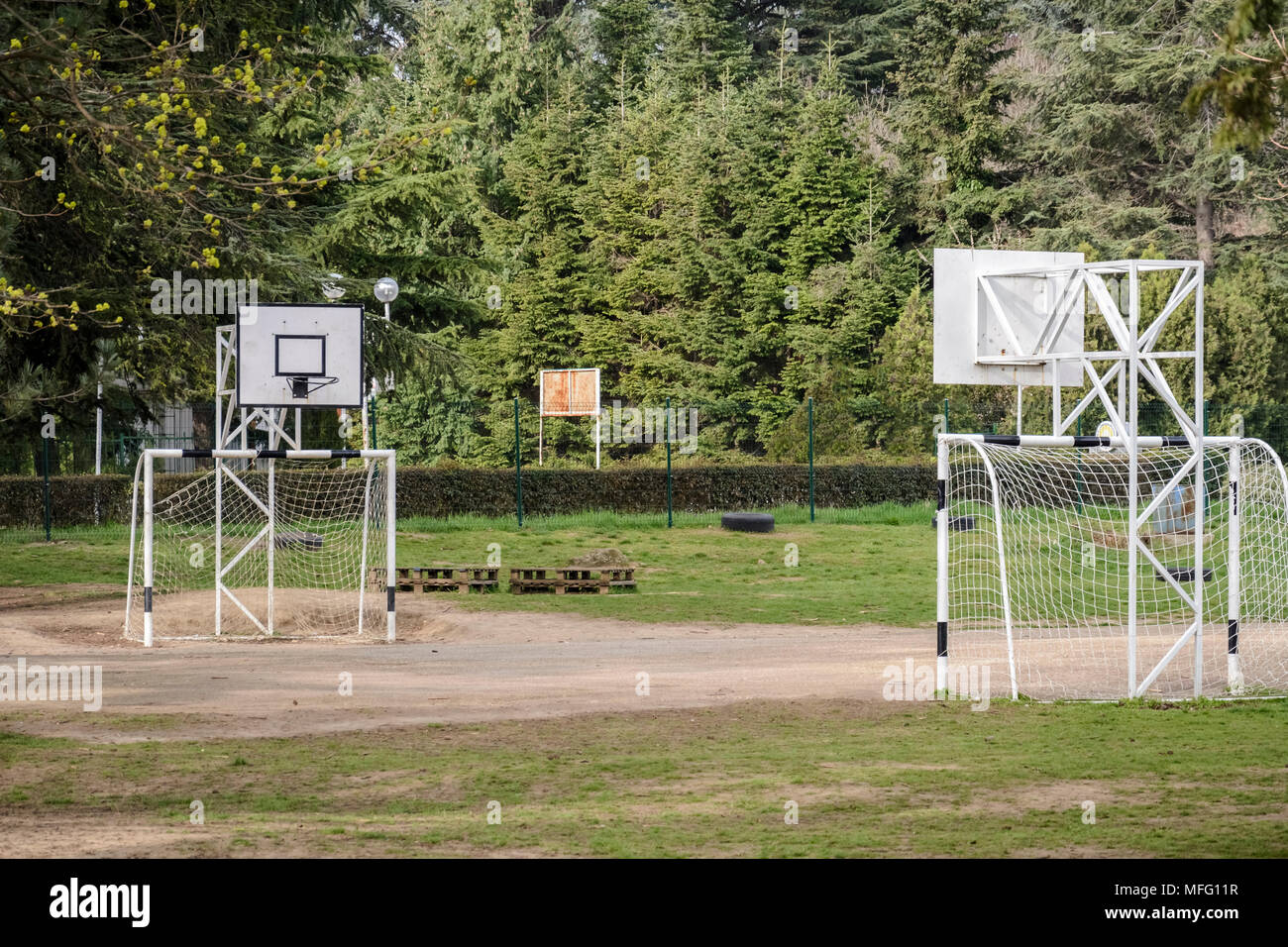 Kids playground in a school, handball net and basket net , surrounded ...