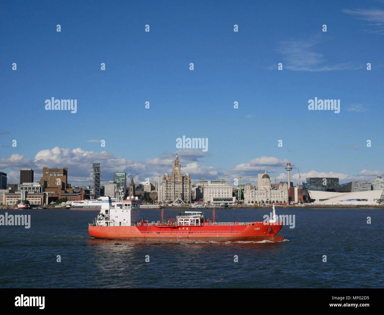 Cargo ship on the river Mersey as it sales past Liverpool Stock Photo ...