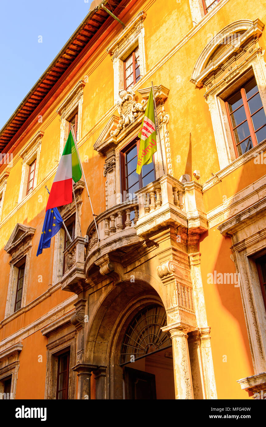 Italian and European Union flags on a balcony of the City Hall of ...