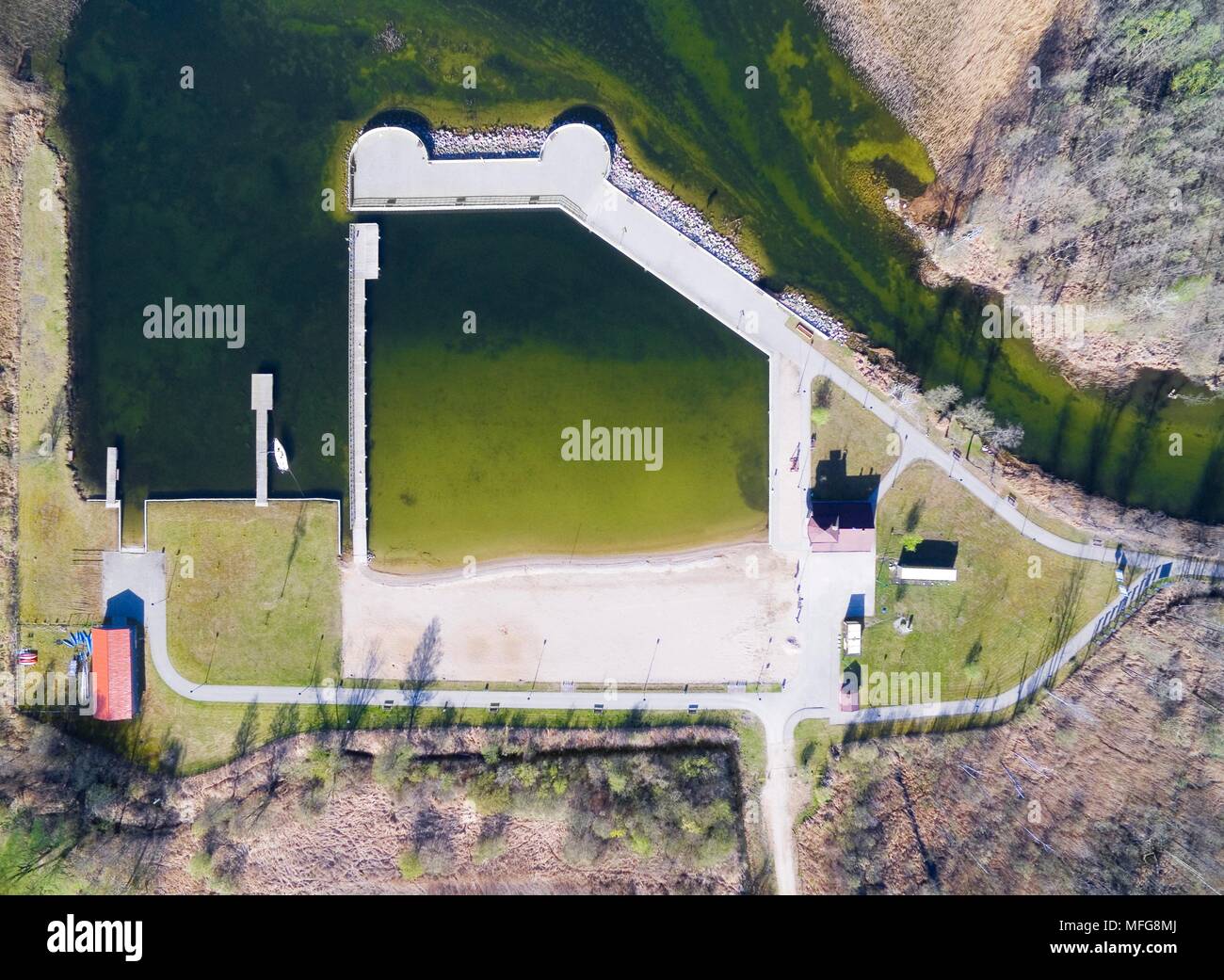 Aerial view of the beach on Mamry lake shore by Wegorapa river estuary ...