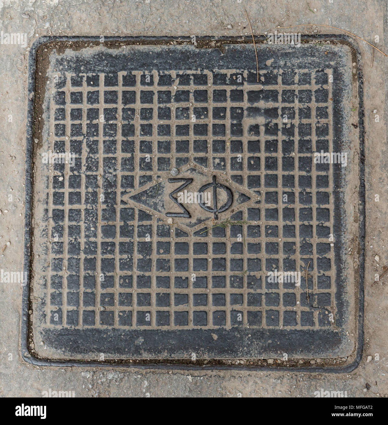 Sigma Phi Square manhole cover in Athens Greece Stock Photo - Alamy