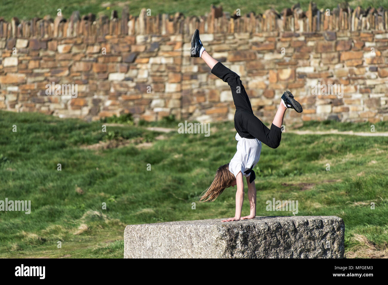 Girl doing handstand hi-res stock photography and images - Alamy