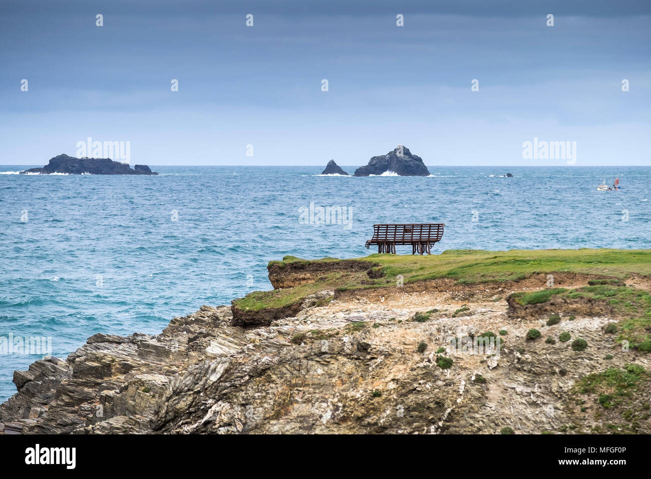 A bench on the coast overlooking the sea Stock Photo - Alamy