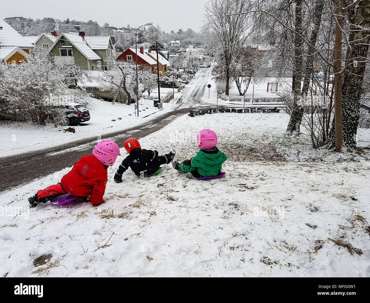 MOLNDAL, SWEDEN - DECEMBER 11, 2017: Children are playing in the snow ...