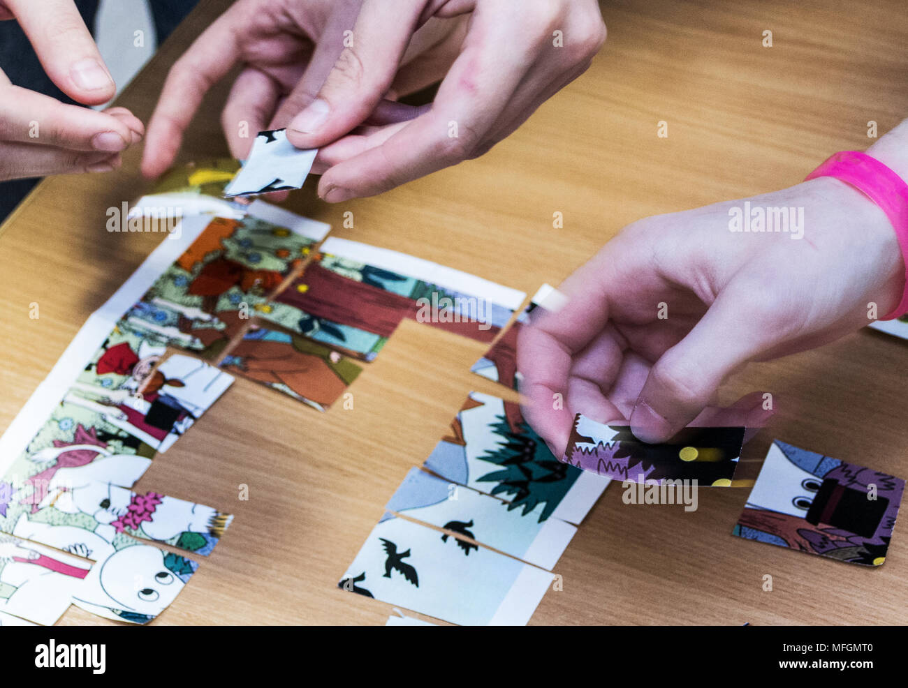 Child teacher table puzzle hi-res stock photography and images - Alamy