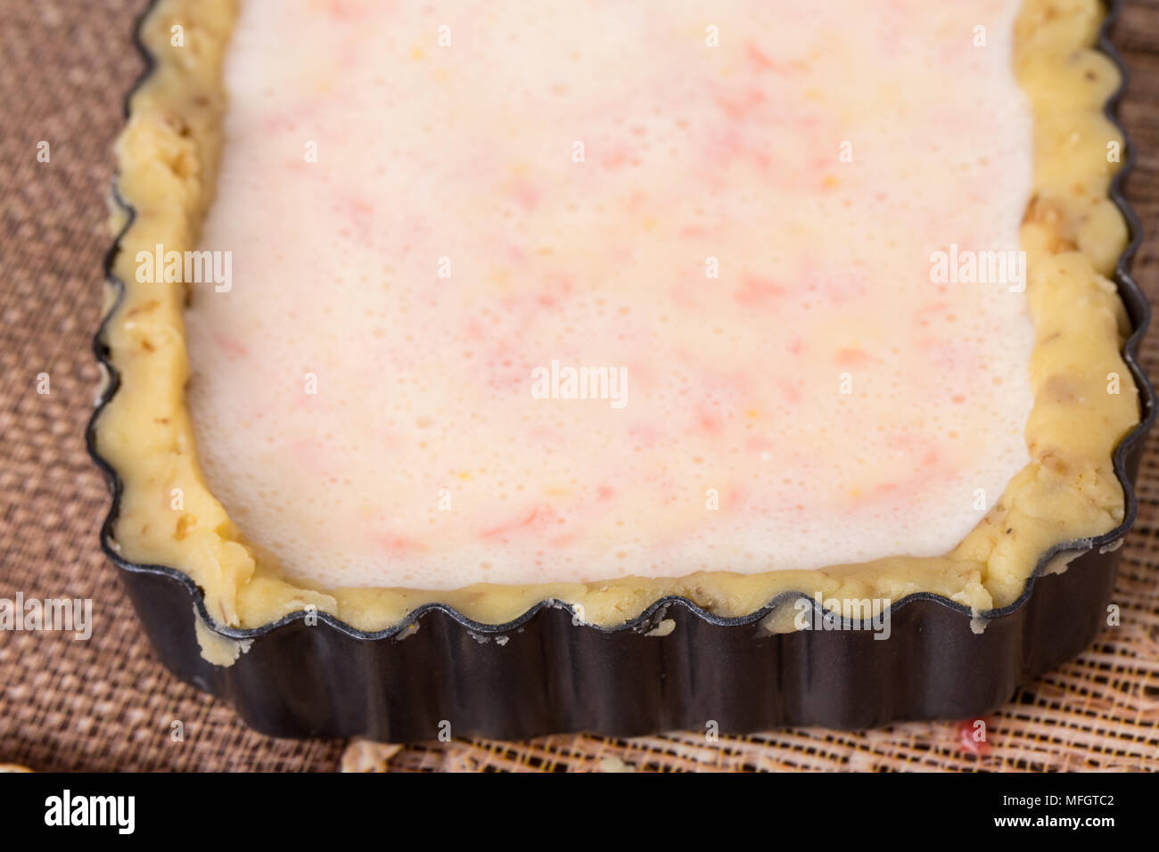 Closeup of uncooked cake. On a table as a background Stock Photo - Alamy