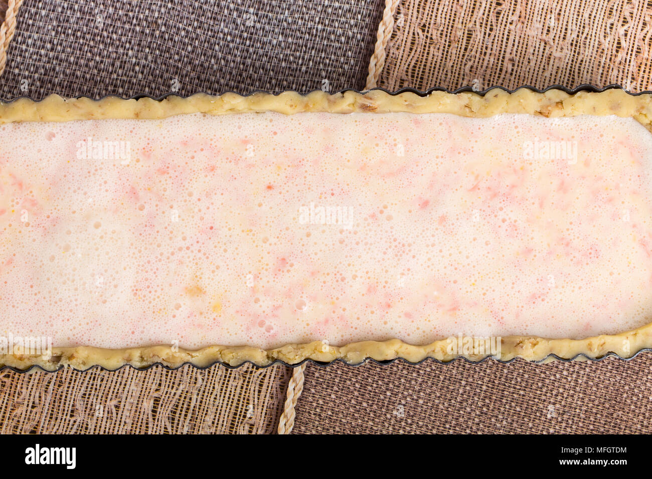 Closeup of uncooked cake. On a table as a background Stock Photo - Alamy
