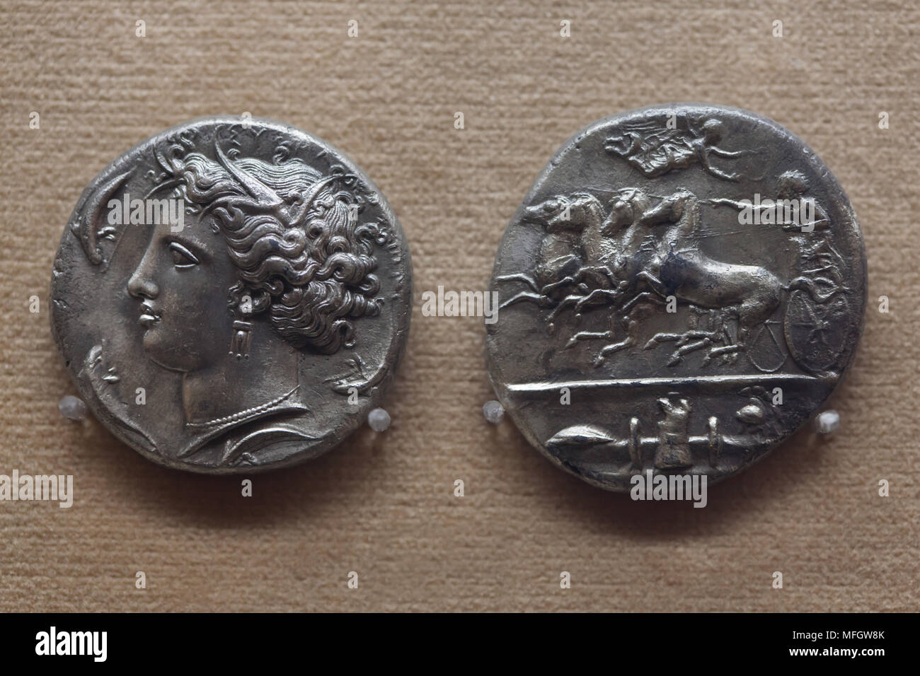 Arethusa surrounded by dolphins and the galloping quadriga depicted in ...