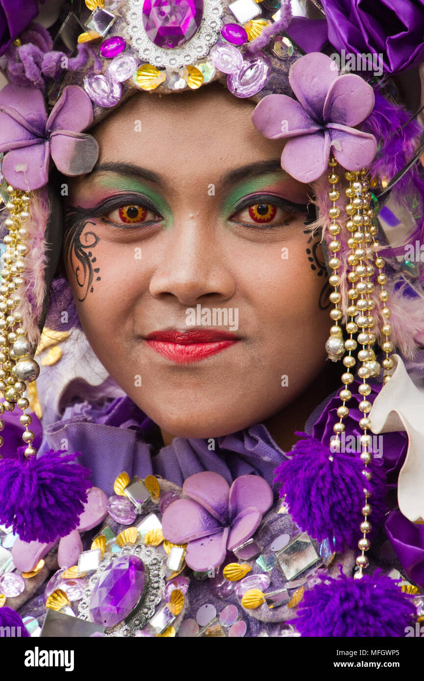 Indonesian woman in carnival costume celebrating Malan's 101st year ...